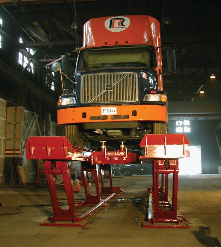 flush mounted parallelogram-shaped lifts | Fleet Maintenance